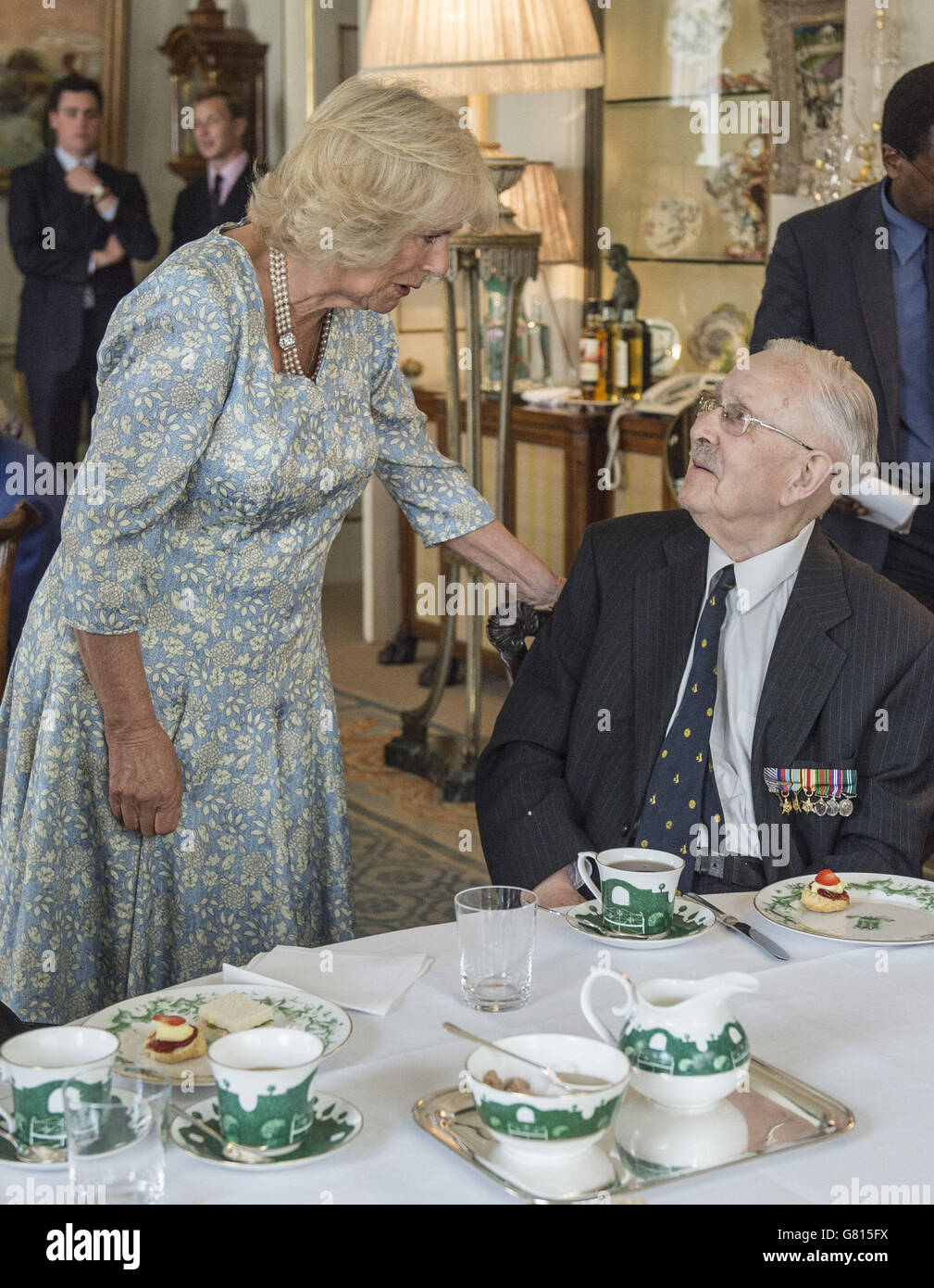 Royal tea party for WWII veterans Stock Photo - Alamy