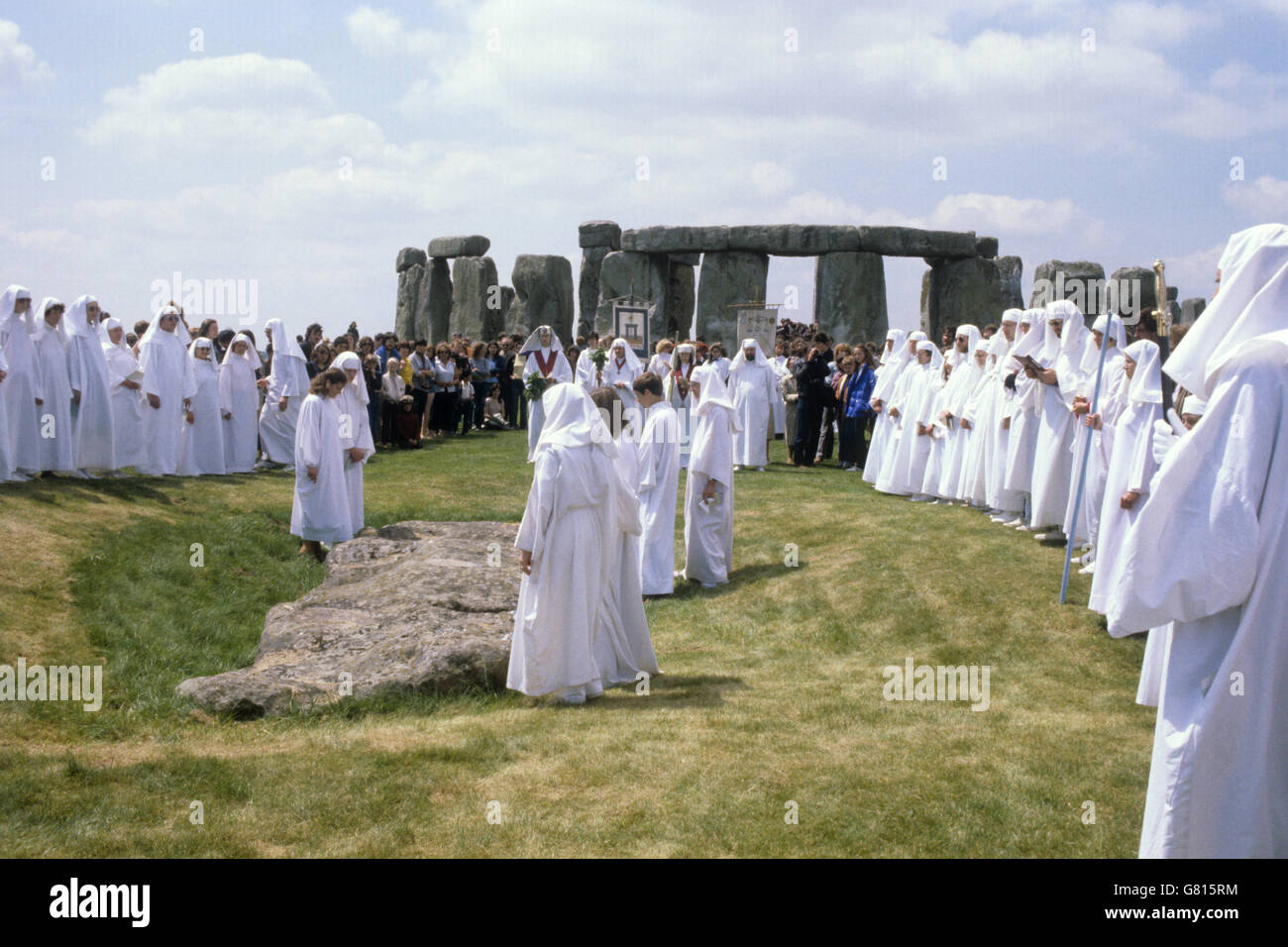 Customs and Traditions - Midsummer Solstice - Stonehenge. White-robed ...