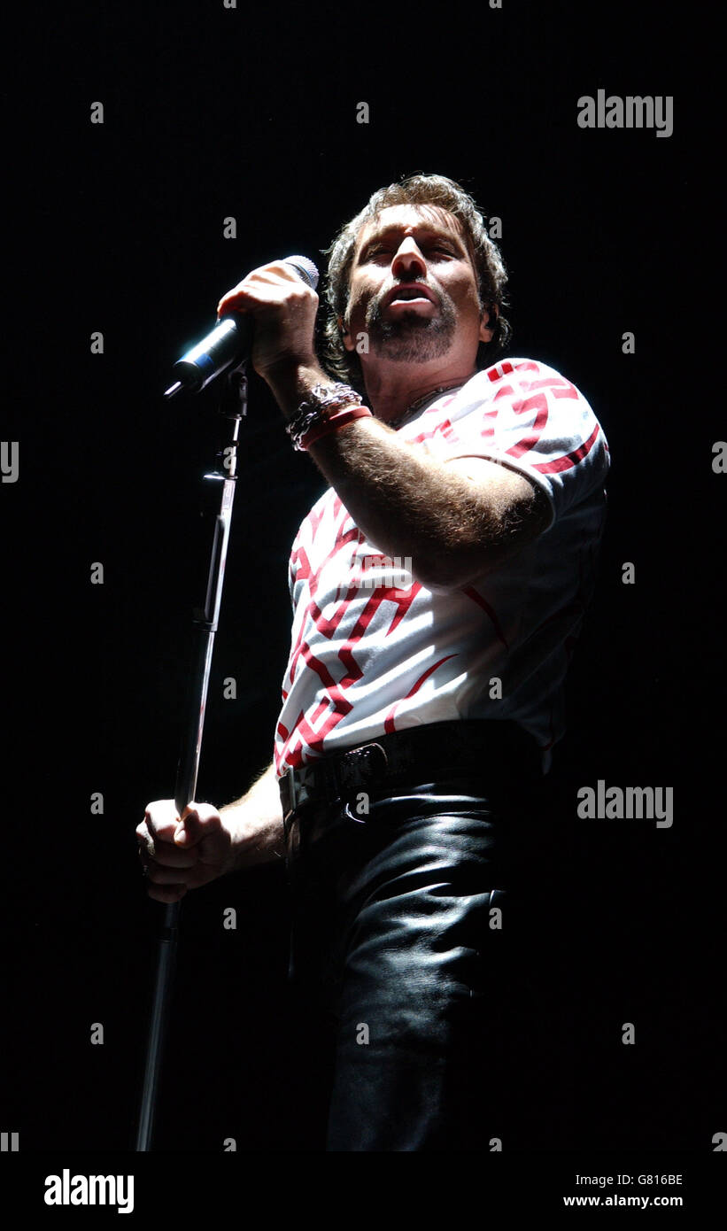 New frontman Paul Rodgers Queen performs live on stage to kick of their ...