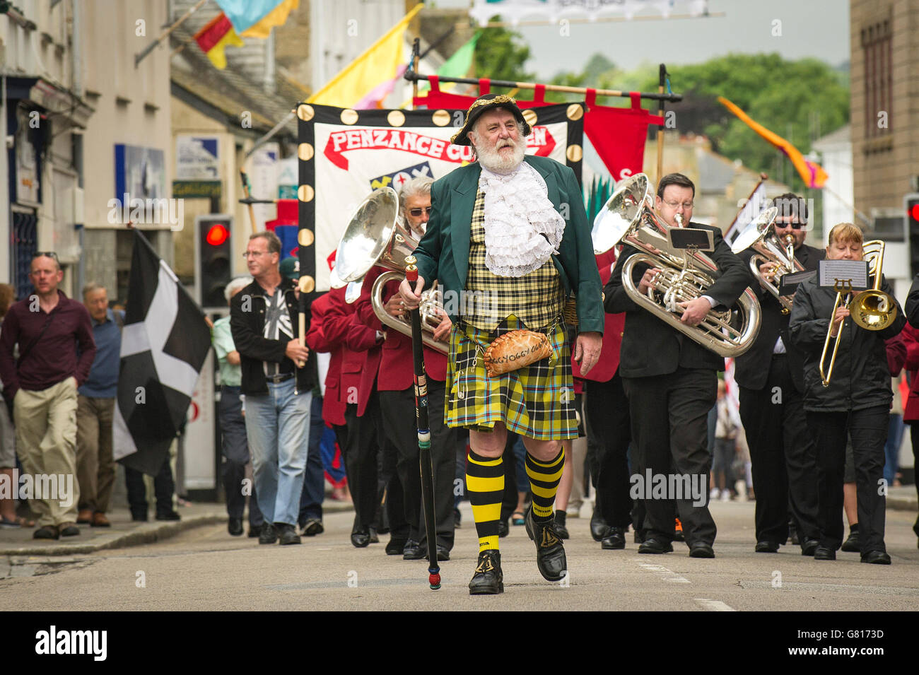 Philip Rowley, Town Crier of Penzance marches at the head of a parade ...