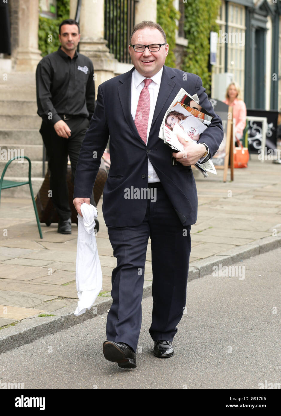 Talent agent Jonathan Shalit, make his way to St Mary's Church in Bury ...