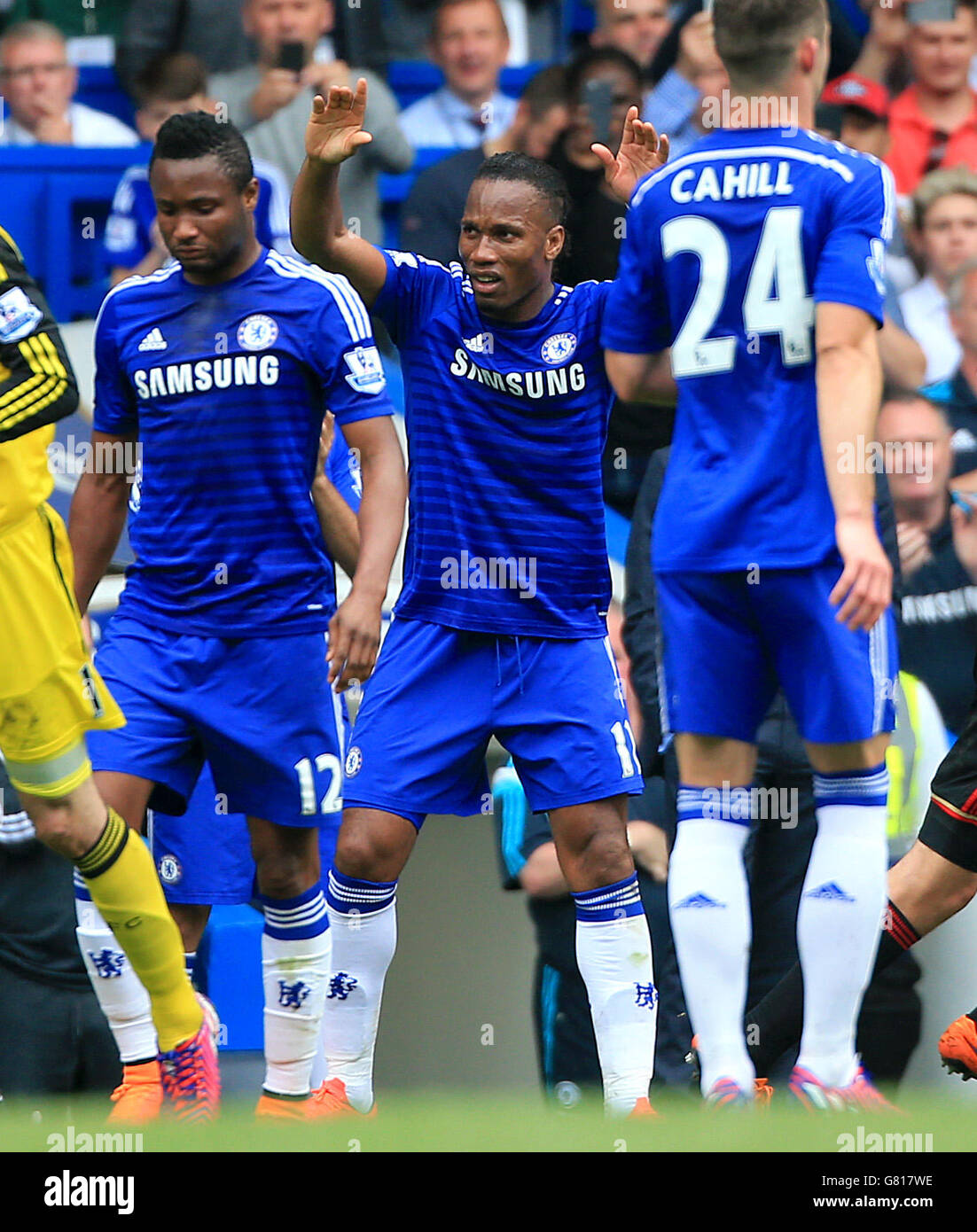 Chelsea's Didier Drogba acknowledges the fans after leaving the pitch ...