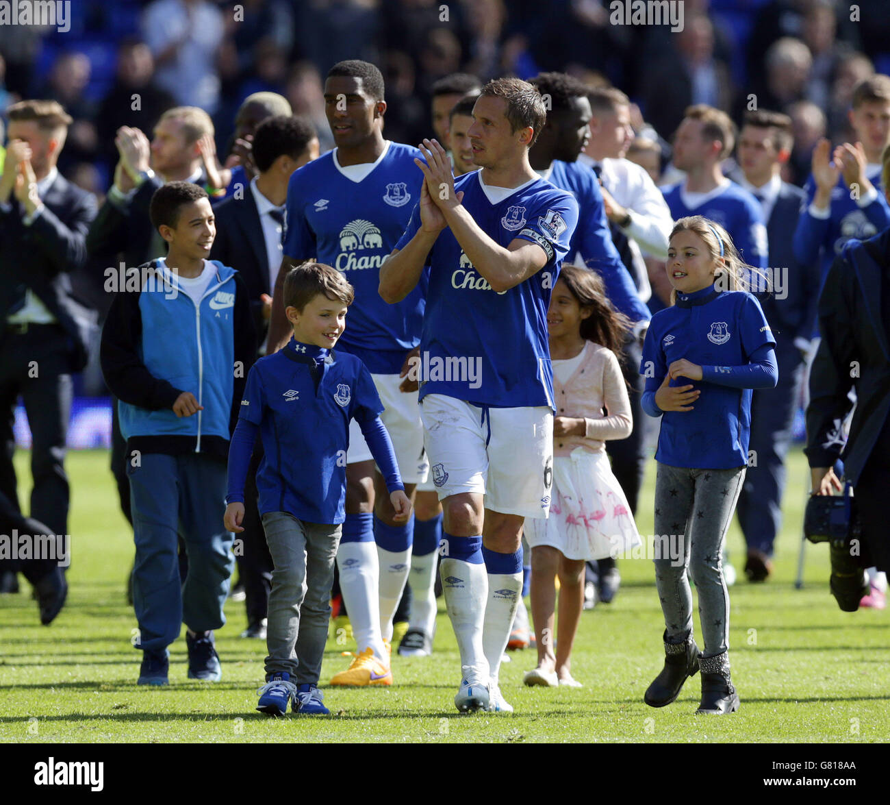 Everton's captain Phil Jagielka leads the team around the pitch after ...