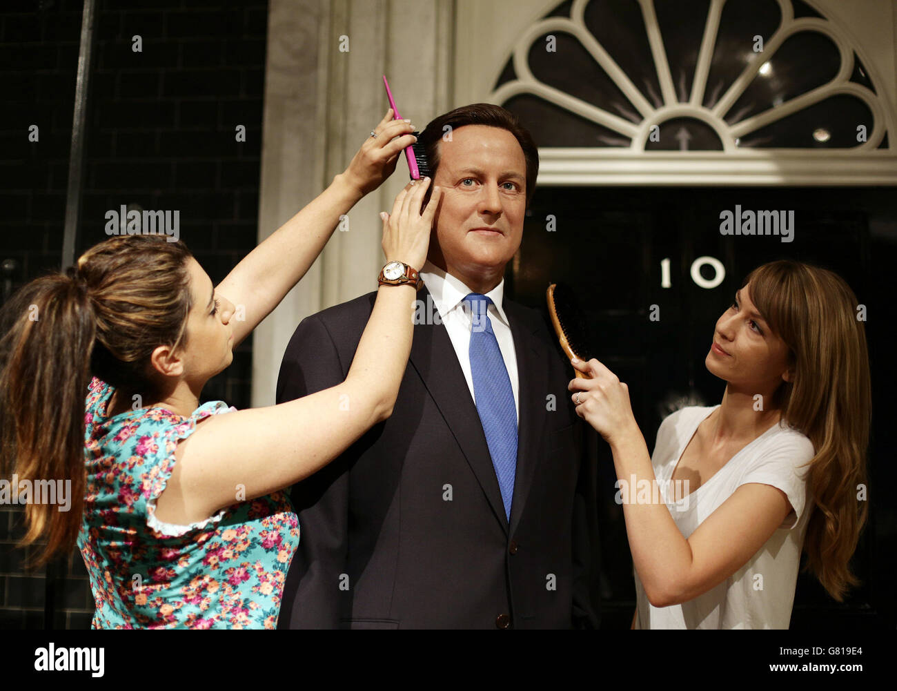 Caryn Mitman (left) and Clare Galvin put the finishing touches on a ...