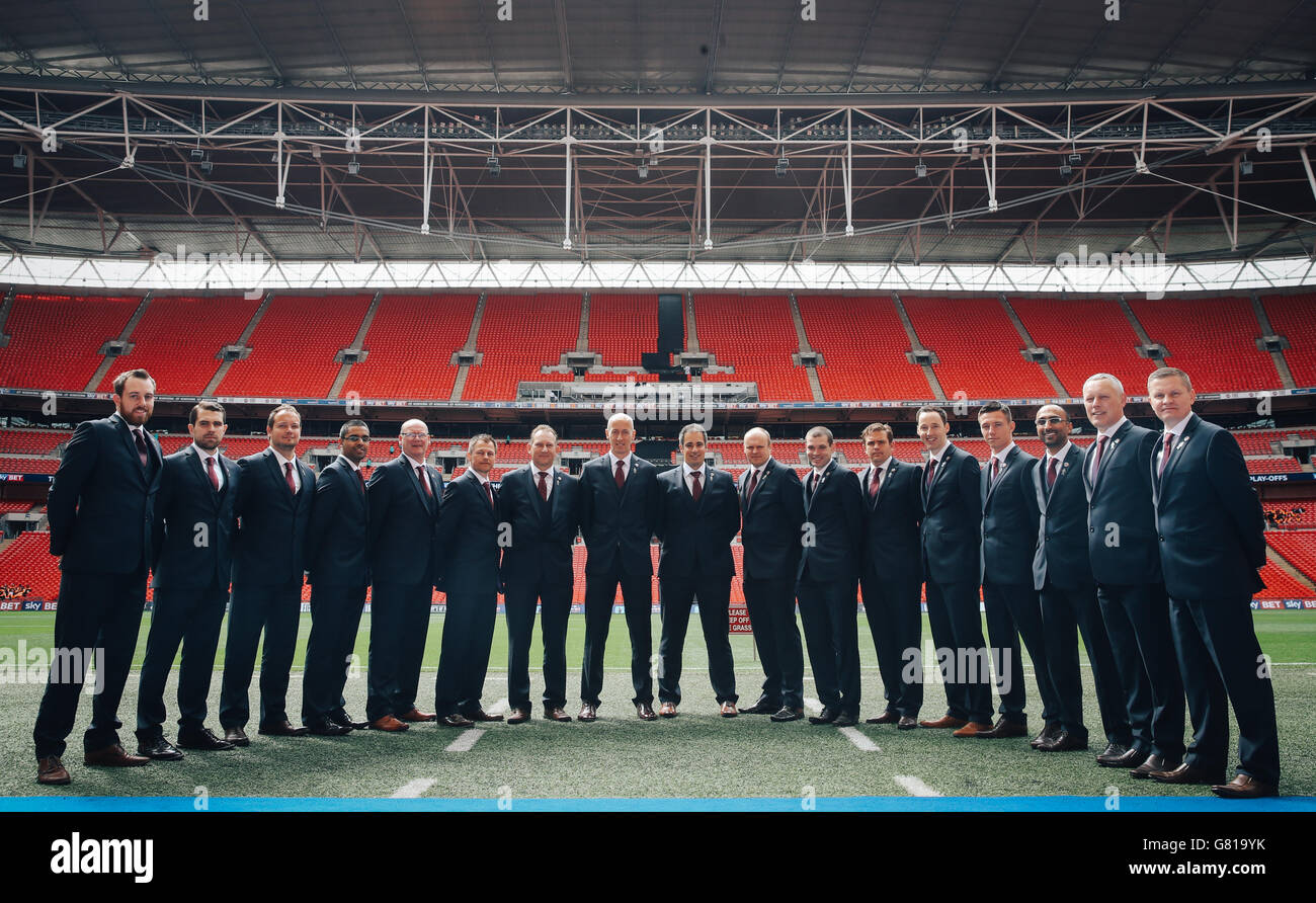 Football league staff pose on the pitch hi-res stock photography and ...