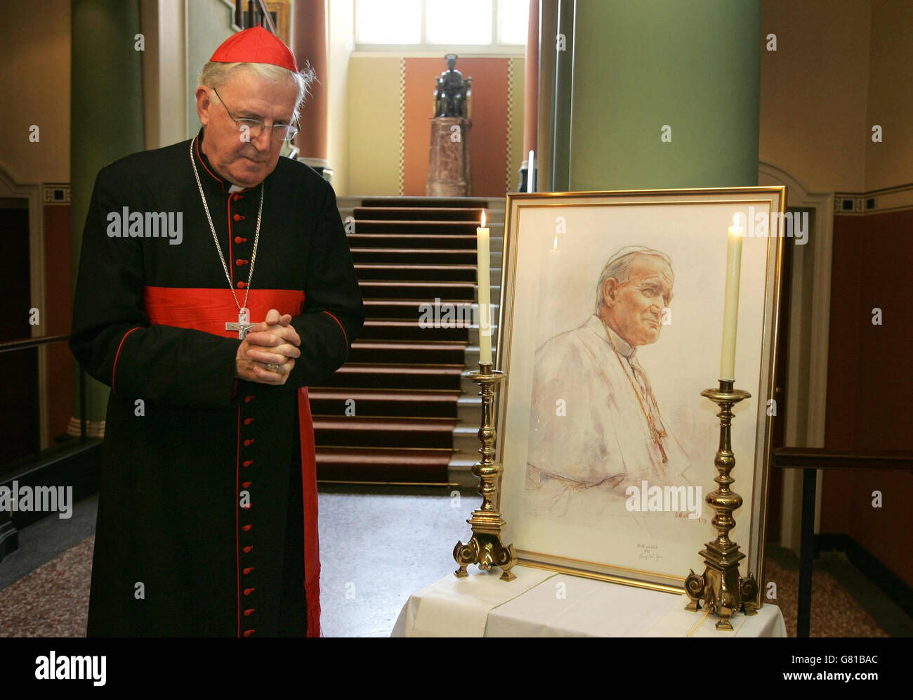 Cardinal Cormac Murphy-O'Connor reflects Stock Photo - Alamy