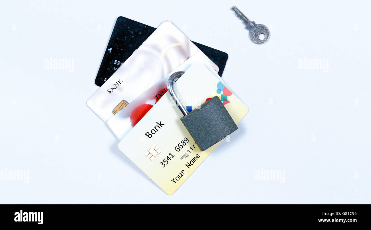Protection against bank card fraud illustrated with a few cards and a ...