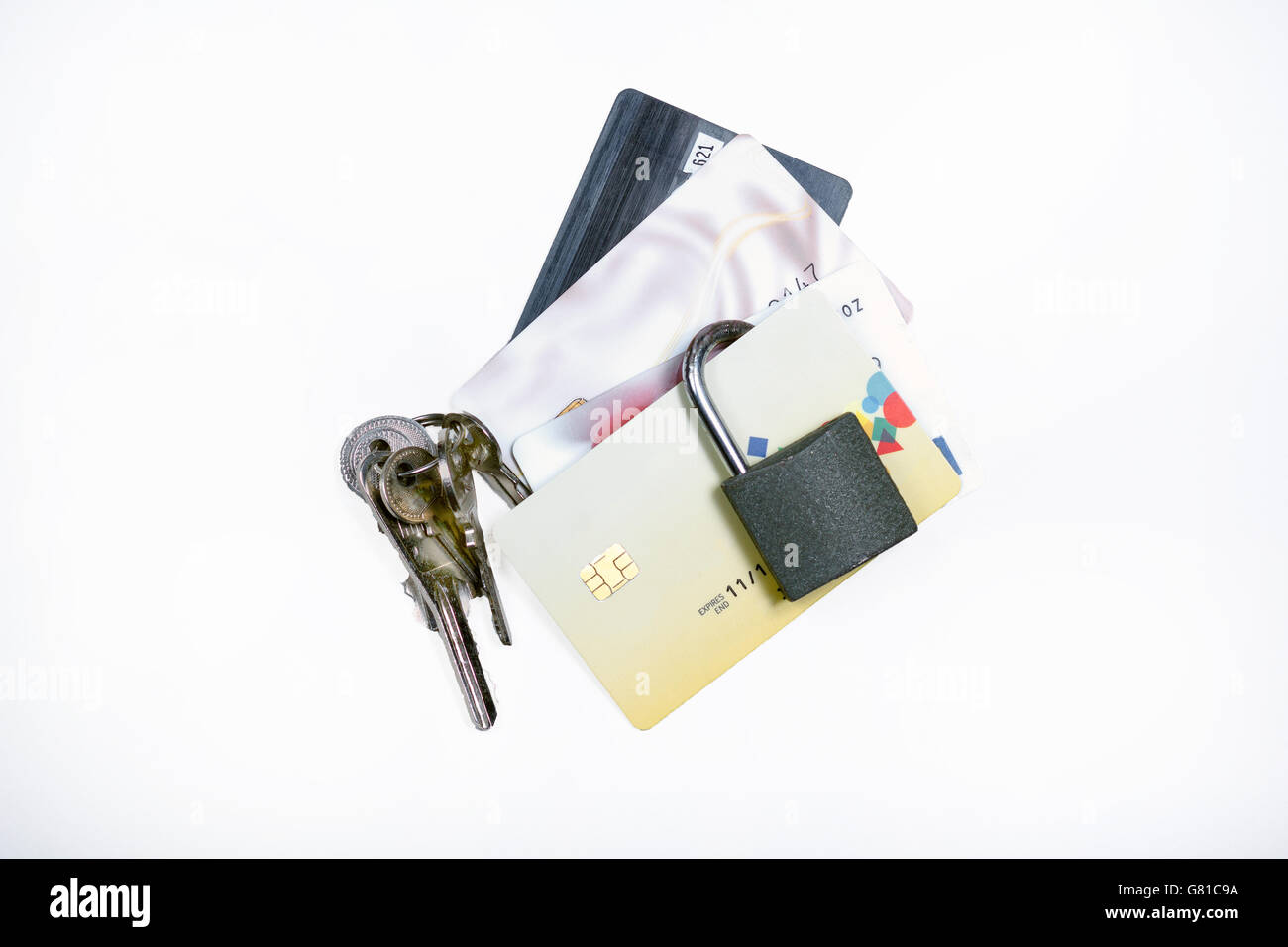 Protection against bank card fraud illustrated with a few cards and a ...