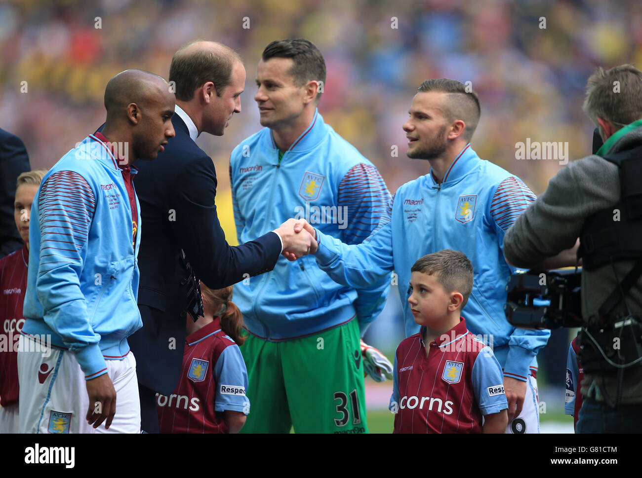 Aston Villa's Tom Cleverley greets The Duke of Cambridge, President of ...