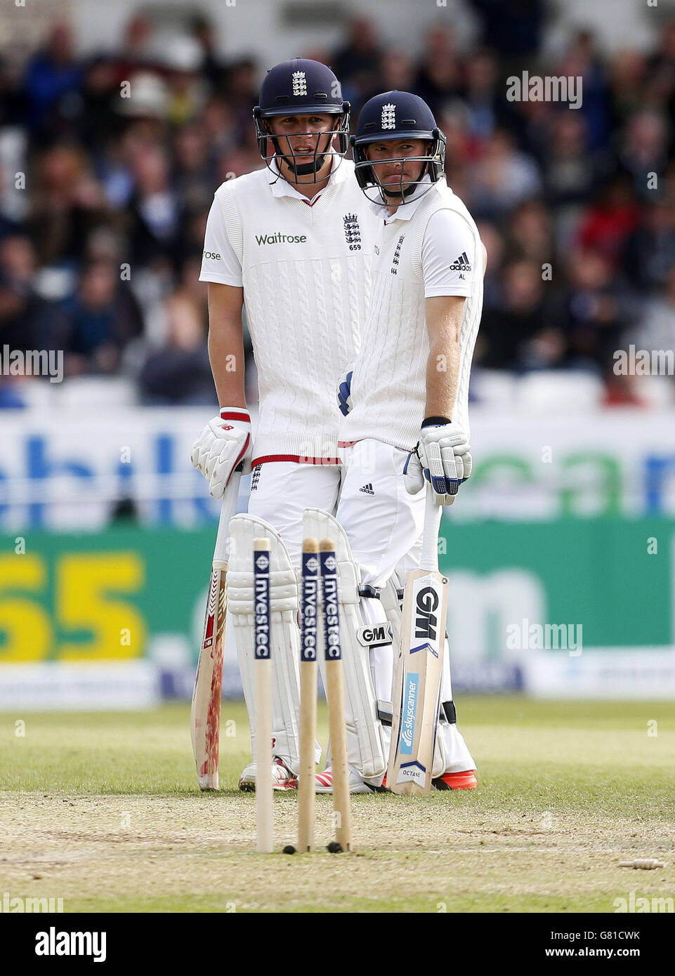 England's Gary Ballance (lbehind) looks at the stumps after Adam Lyth ...