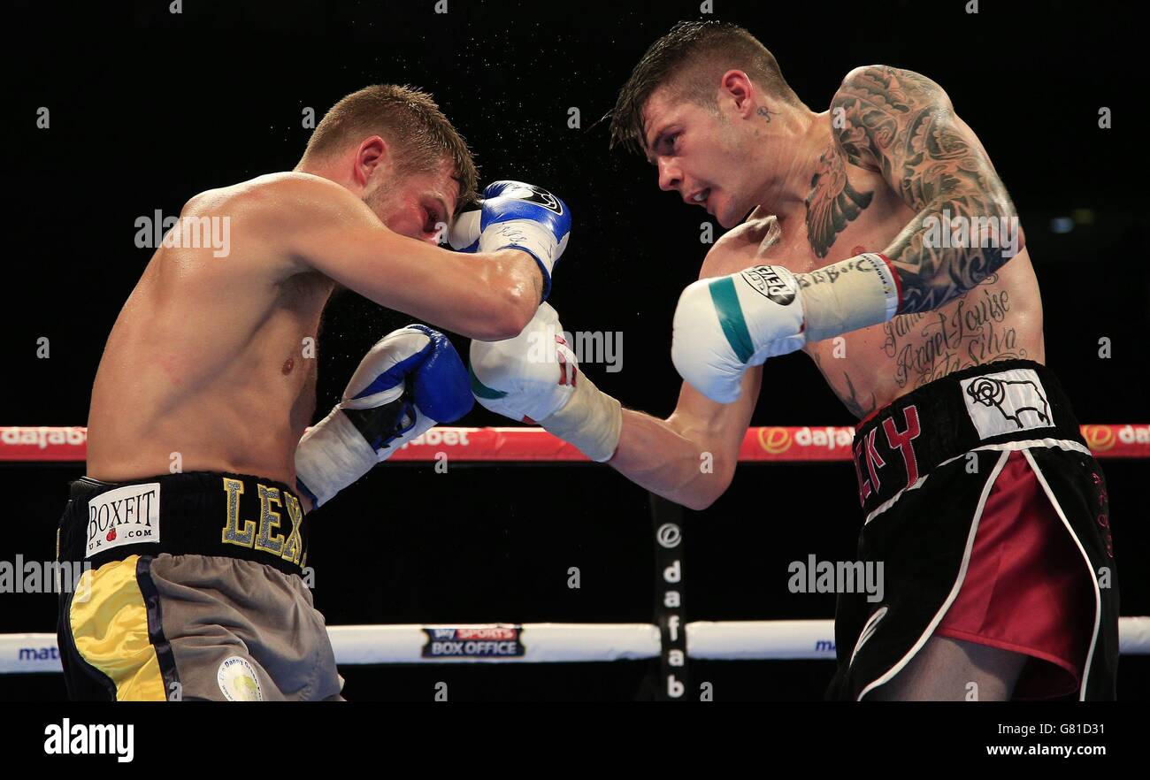 Dave Ryan (right) fights John Wayne Hibbert in their Commonwealth super ...