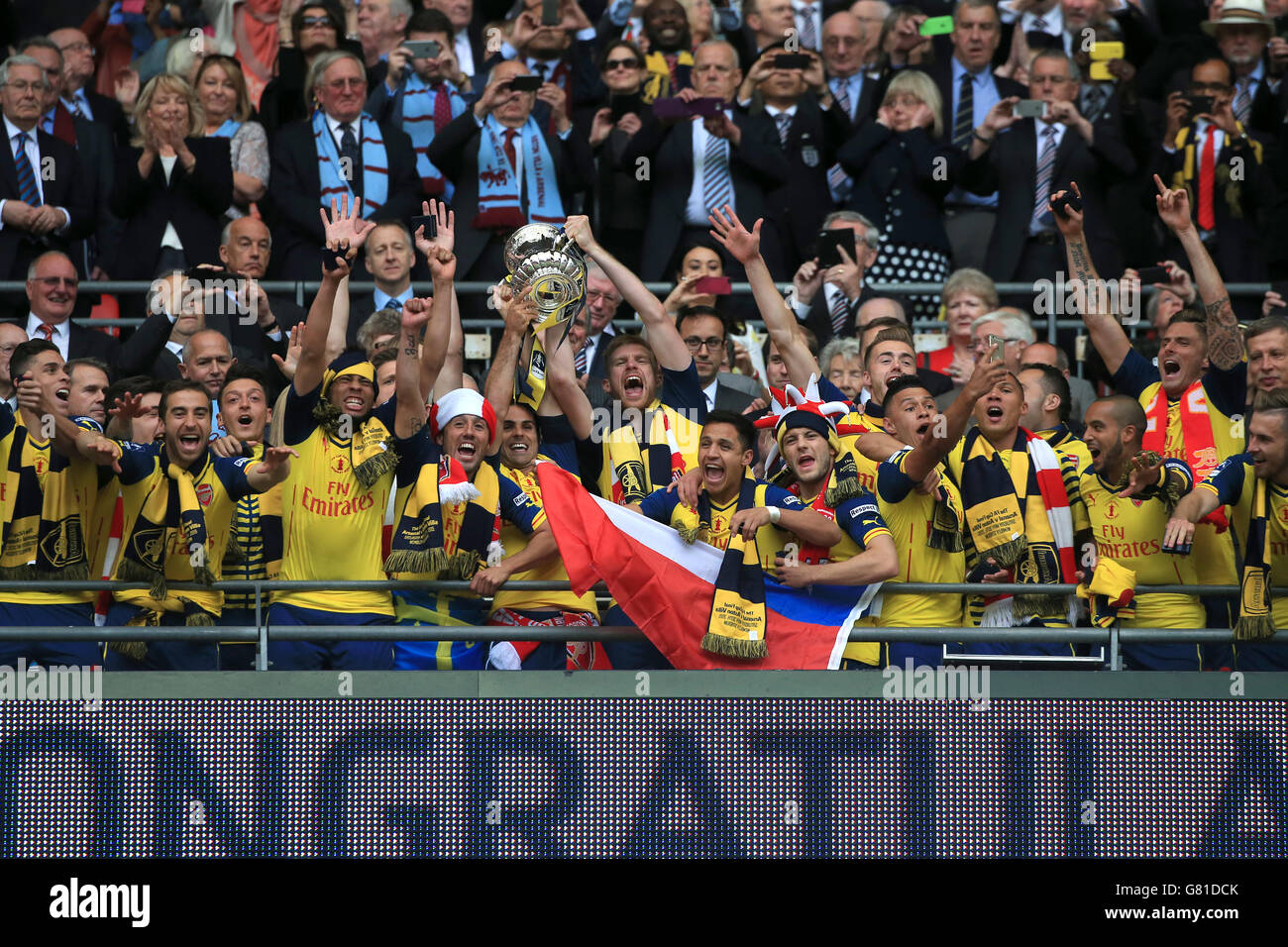 Arsenal players celebrate on the Wembley balcony following their ...