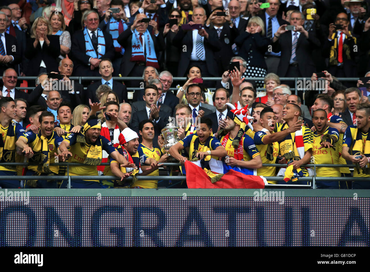 Arsenal players celebrate on the Wembley balcony following their ...