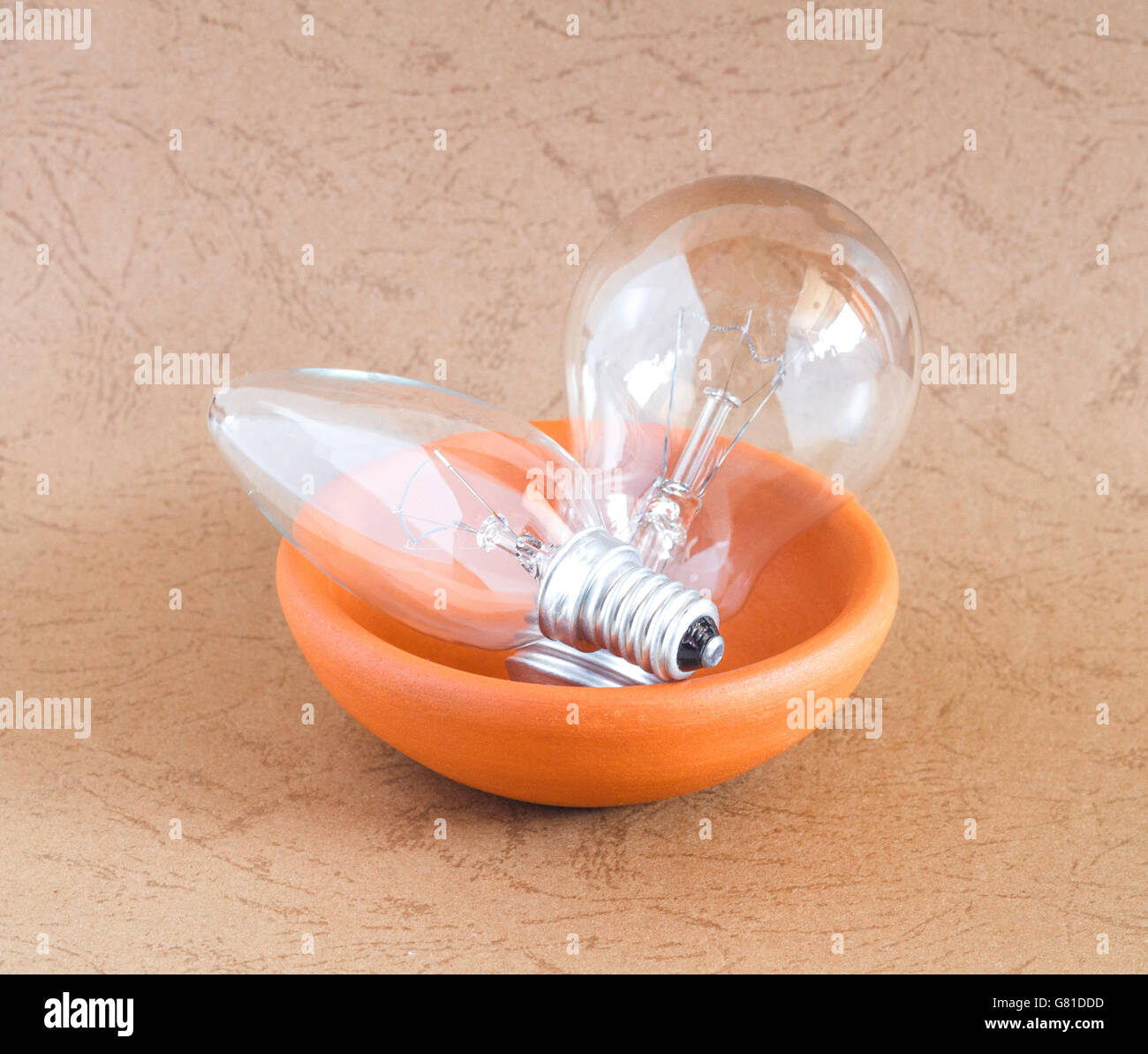 Light bulb in a ceramic bowl isolated on various backgrounds Stock ...