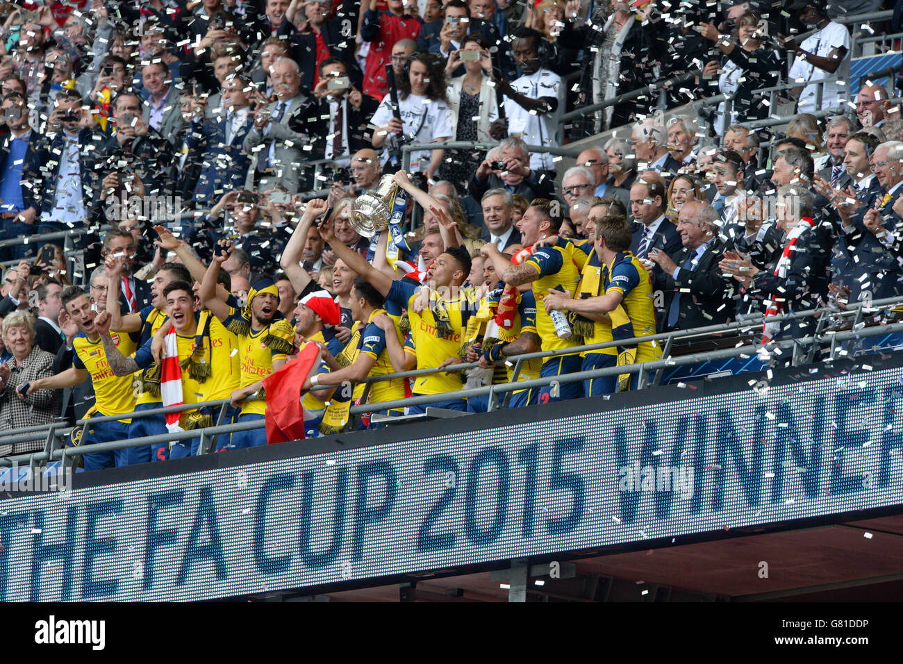 Arsenal players celebrate with the FA Cup Trophy at the end of the FA ...