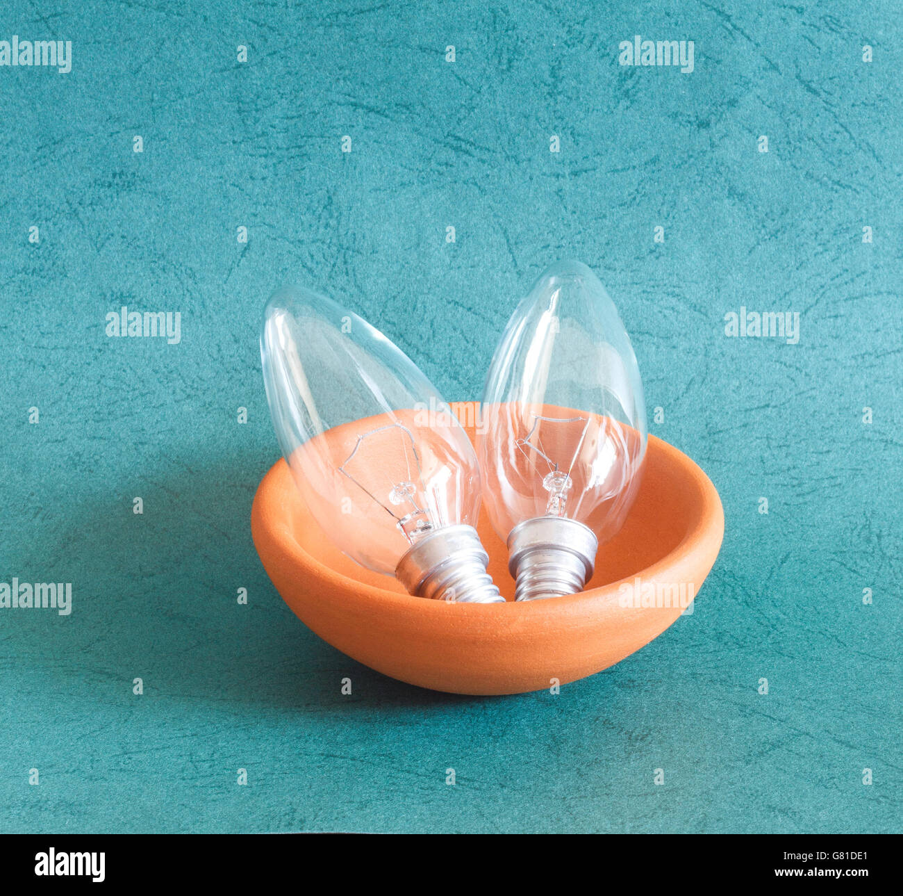 Light bulb in a ceramic bowl isolated on various backgrounds Stock ...