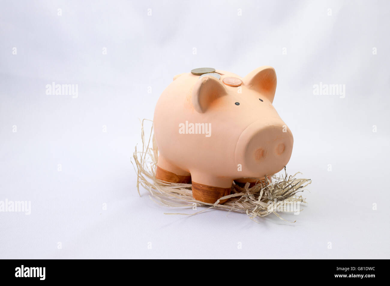 Funny toy figure, a pinky pig money bank Stock Photo - Alamy