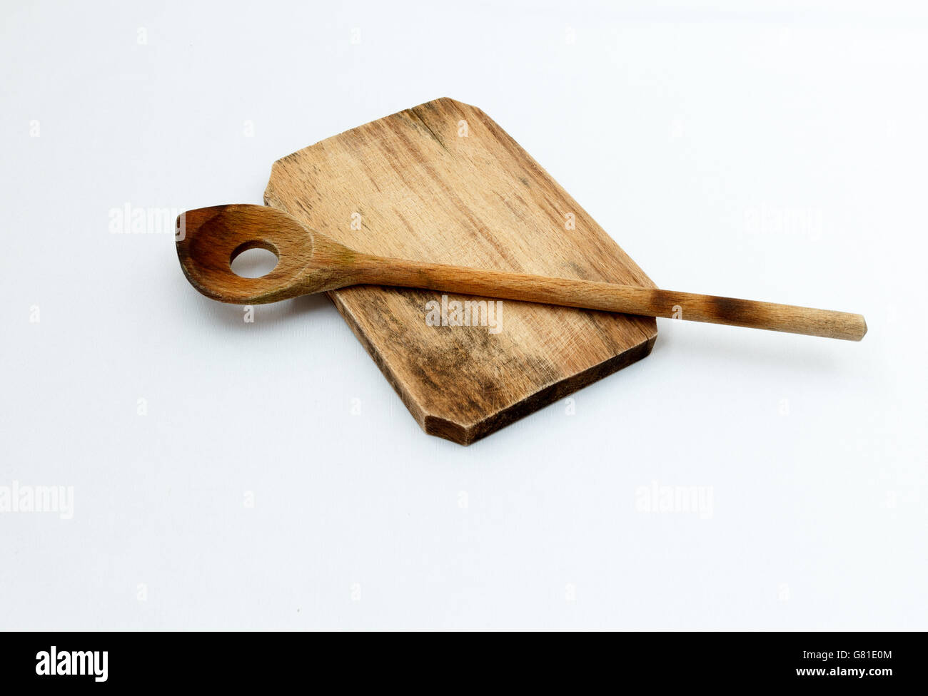 Wooden cutboard and kitchen tools isolated on white Stock Photo - Alamy