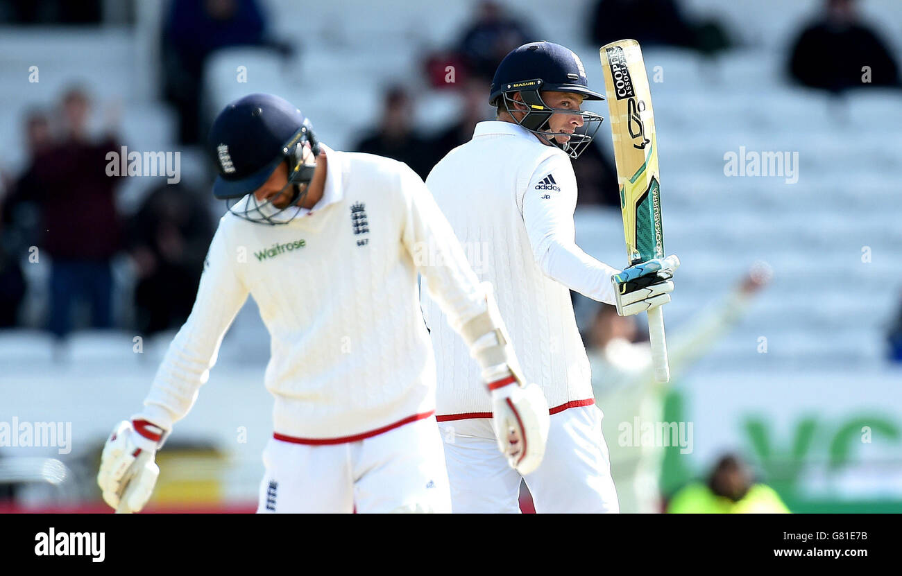 England's Jos Butler (right) celebrates his half century against New ...