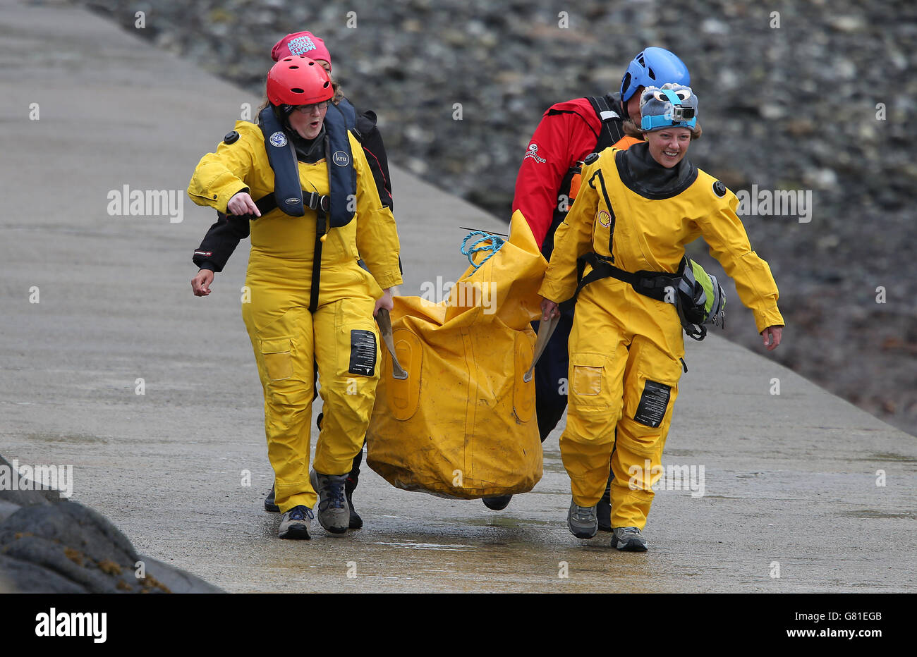 British Divers Marine Life Rescue carry equipment as they arrive to ...