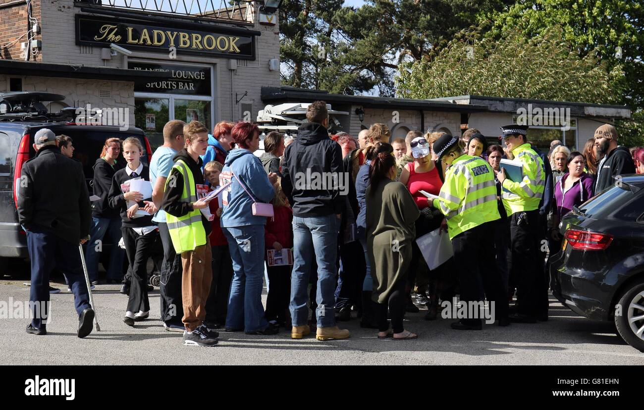 Volunteers from the local community gather at The Lady Brook sports bar ...