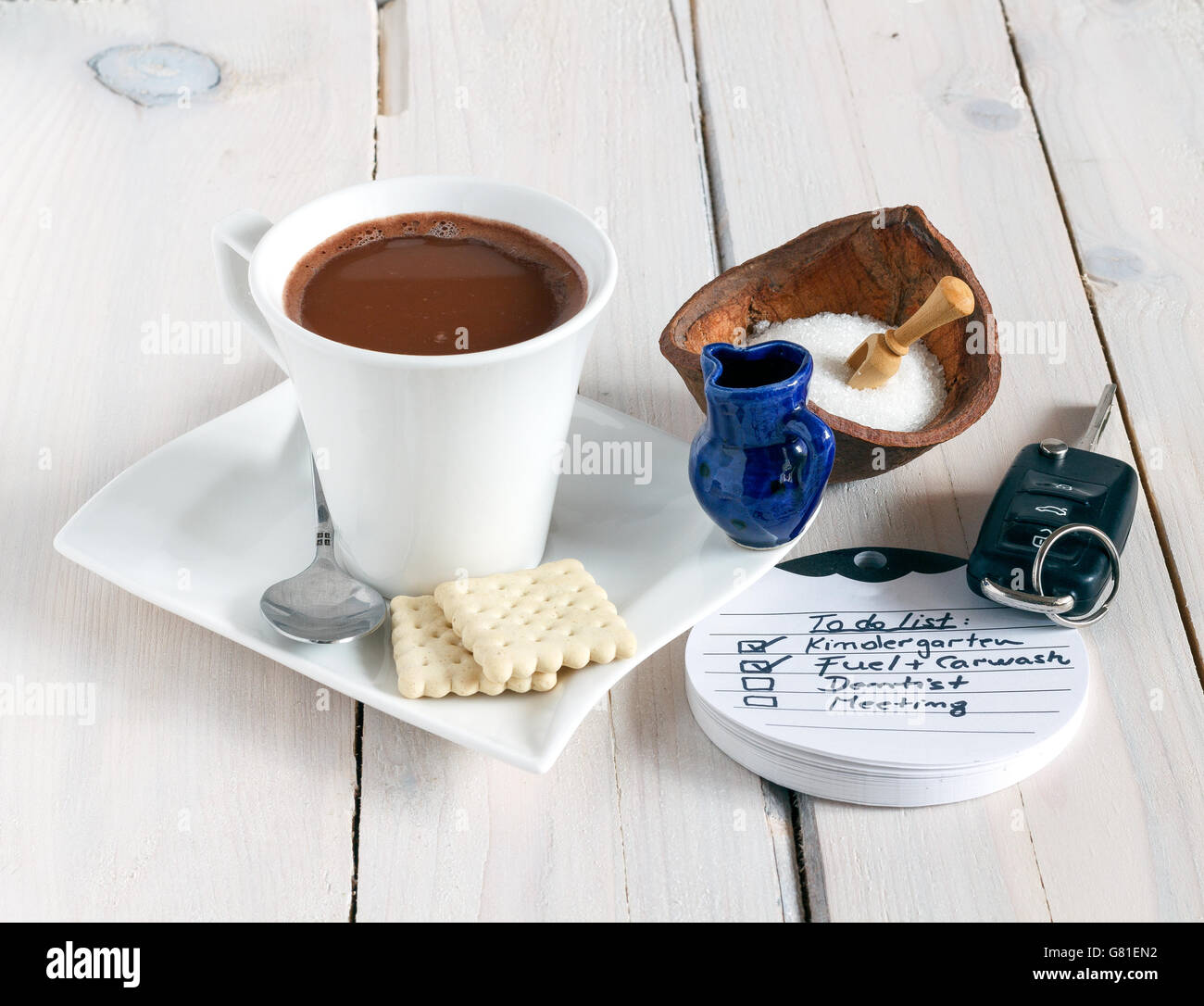 Morning coffee on a white wooden texture with several other beverages ...