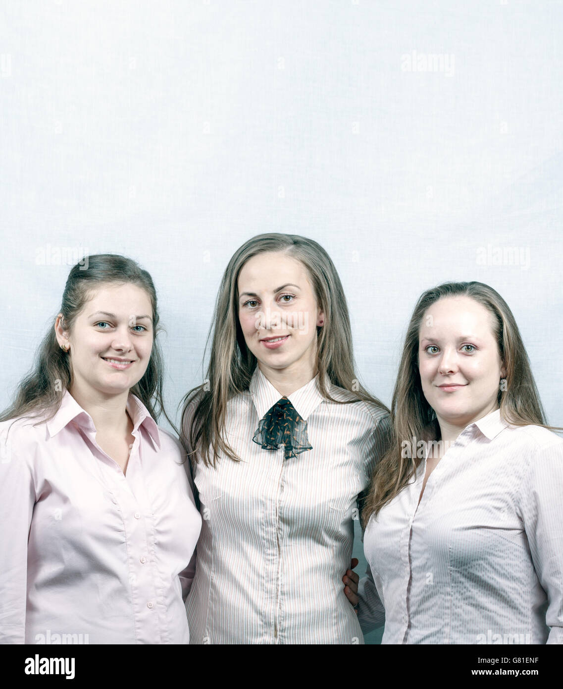 Group of three business women on white background Stock Photo - Alamy