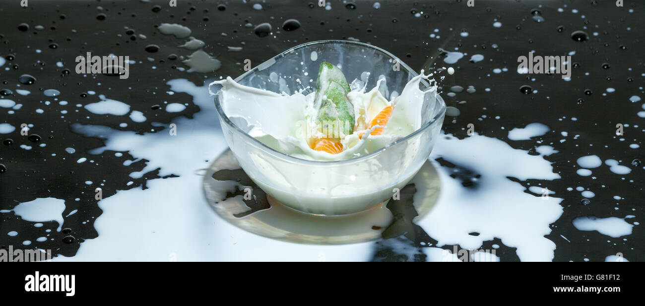 Milk splashing fruit hi-res stock photography and images - Alamy