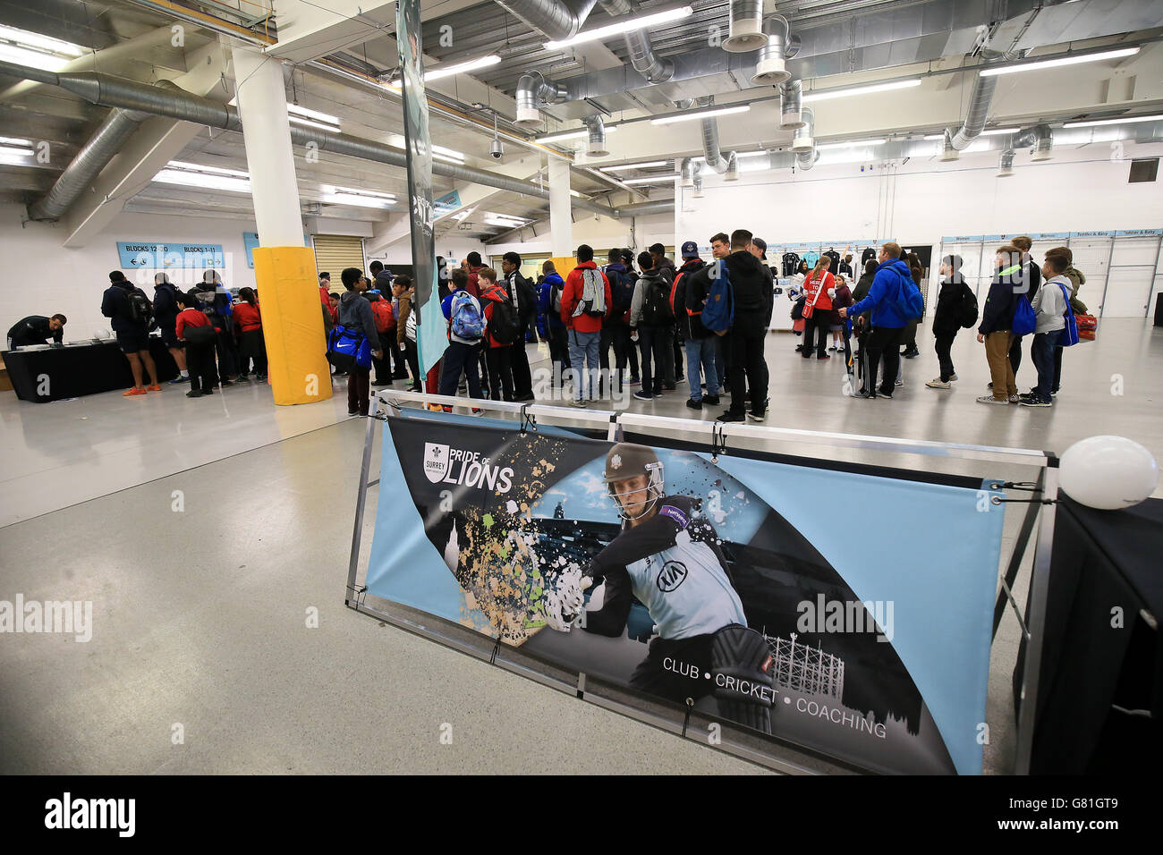 Children queue at the freebie table in the Jardine Suite on Schools Day ...