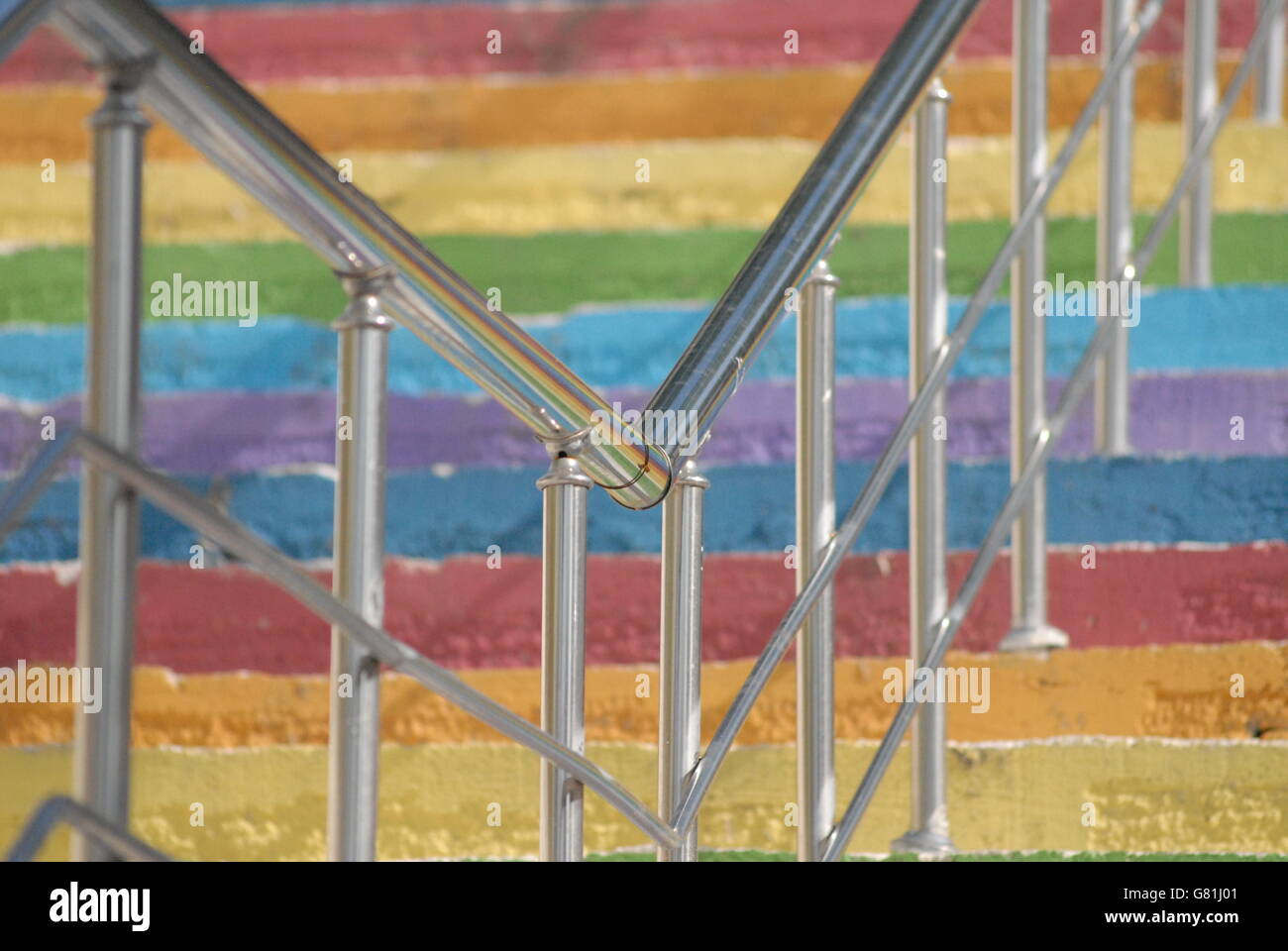Colorful stairs with chromium-plating handrails Stock Photo - Alamy