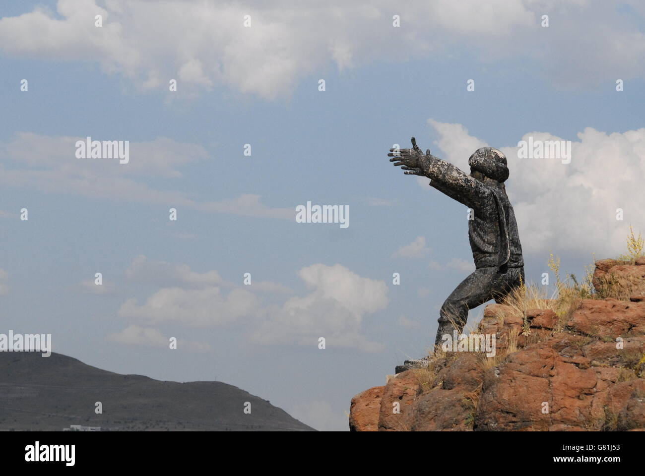Human figure at the rocky hill Stock Photo - Alamy