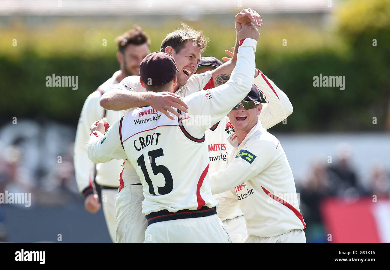 Lancashire's Tom Bailey celebrates taking the wicket of Derbyshire's ...