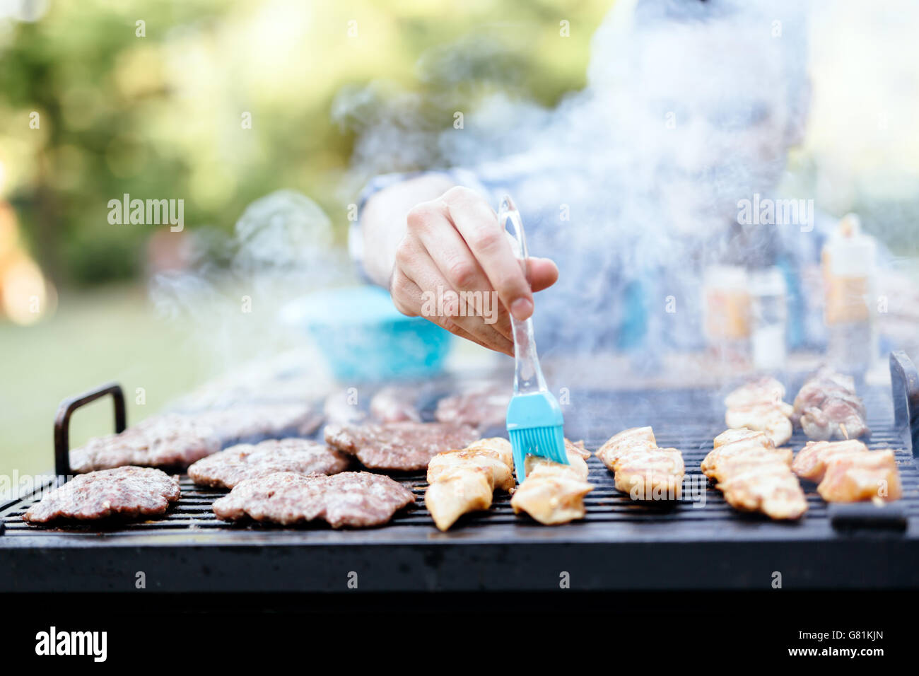 Barbecue spices and seasonings being added to meat Stock Photo - Alamy
