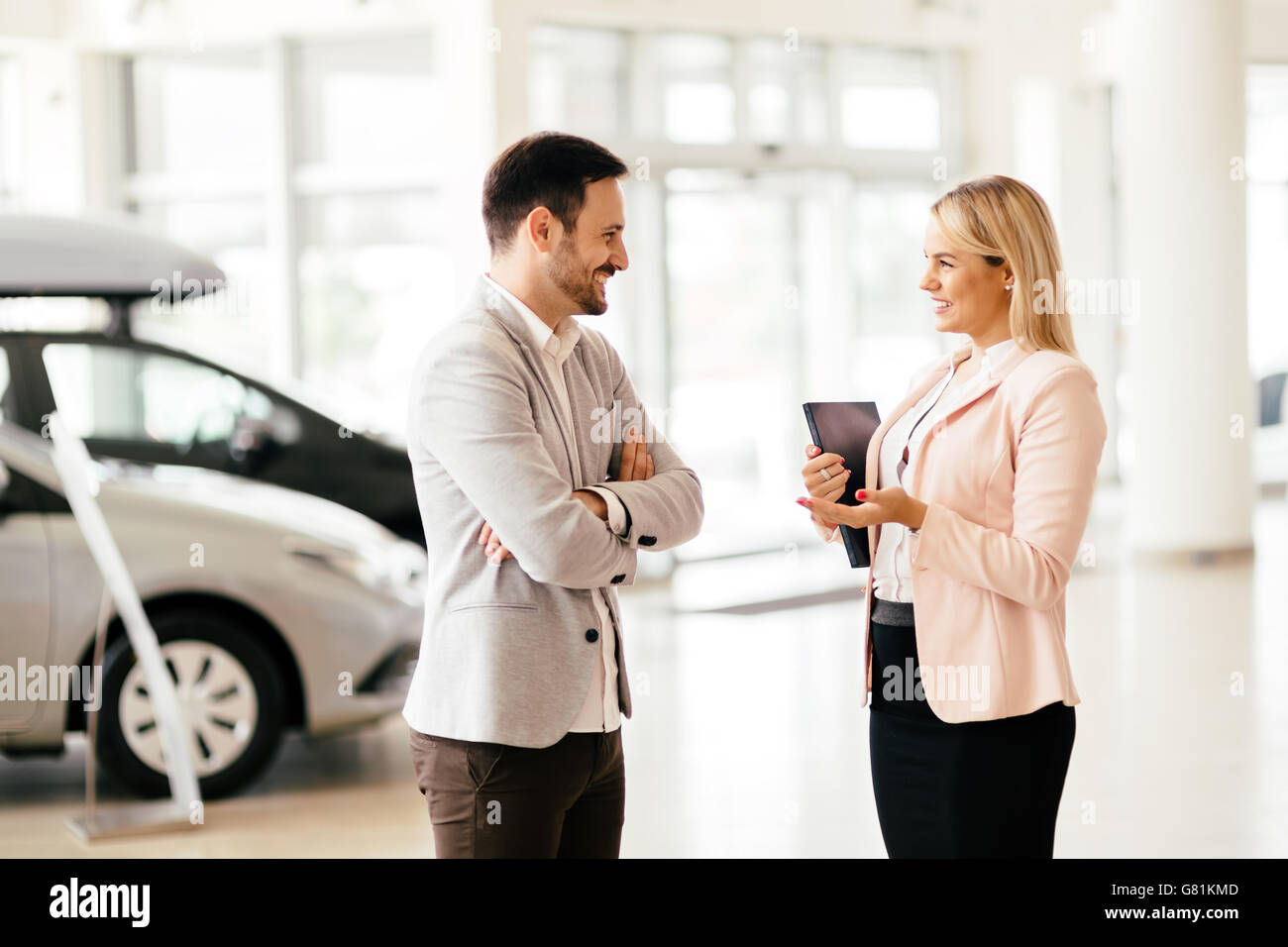 Salesperson showing vehicle potential hi-res stock photography and ...