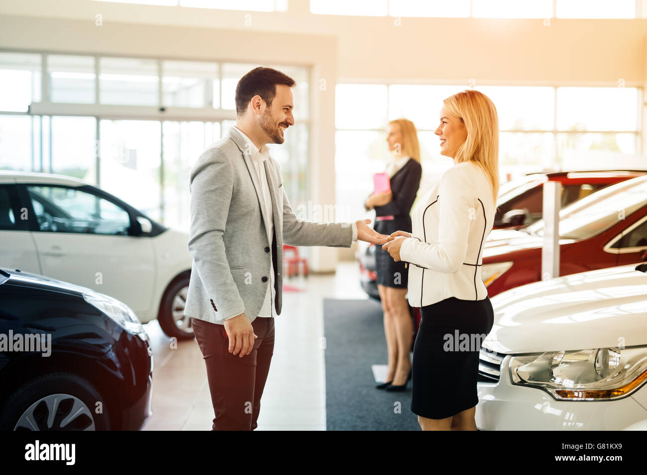 Salesperson showing vehicle potential hi-res stock photography and ...