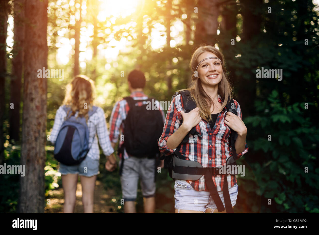 People exploring forest as recreation Stock Photo - Alamy