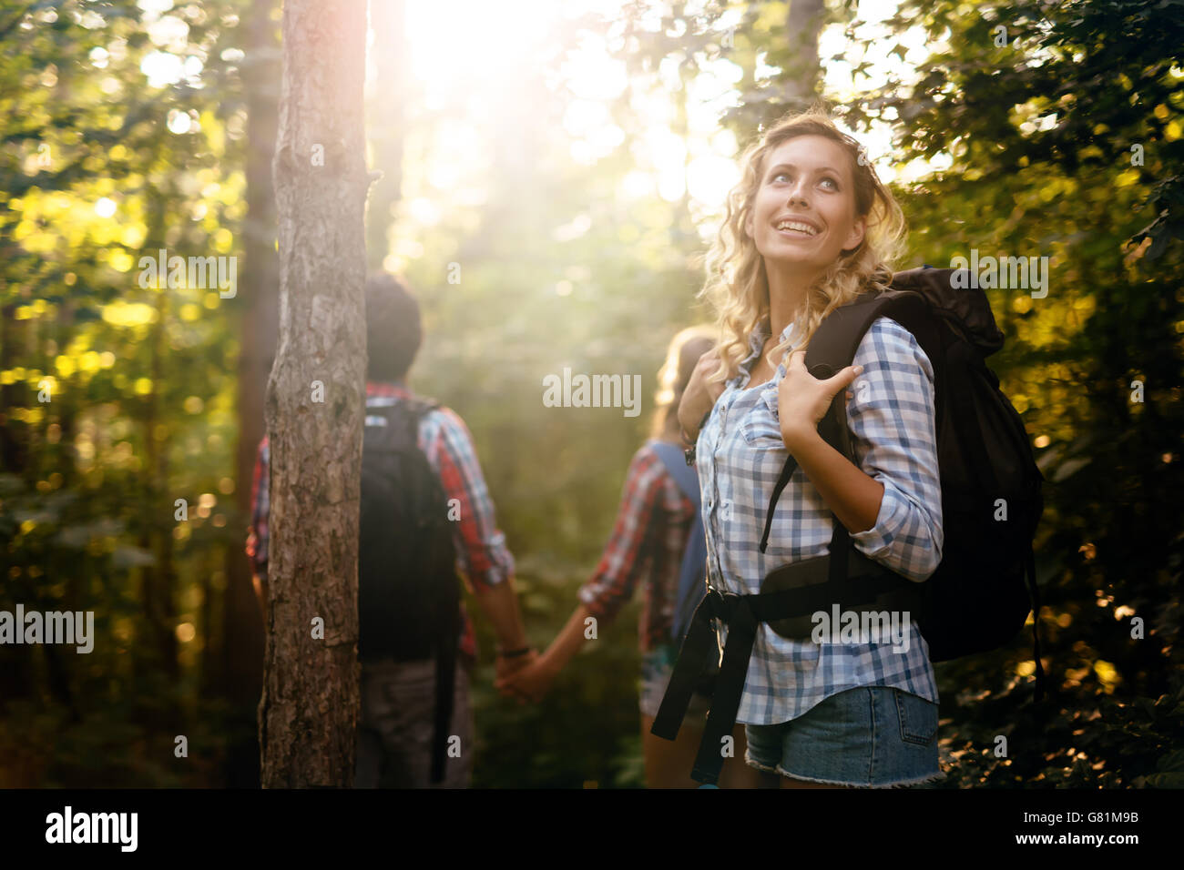 People exploring forest as recreation Stock Photo - Alamy