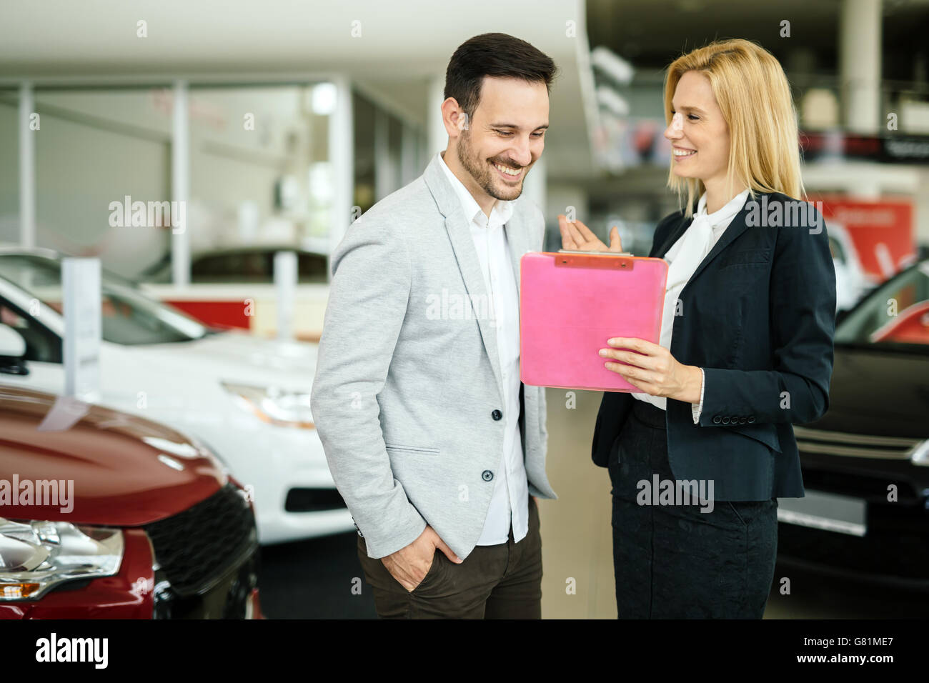 Salesperson showing vehicle potential hi-res stock photography and ...