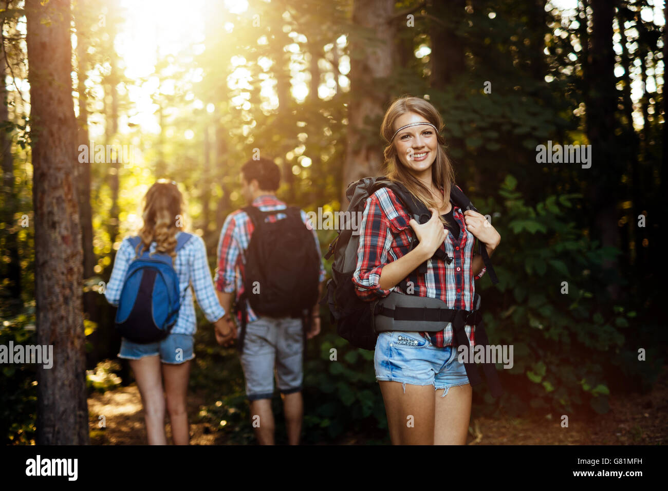 People exploring forest as recreation Stock Photo - Alamy