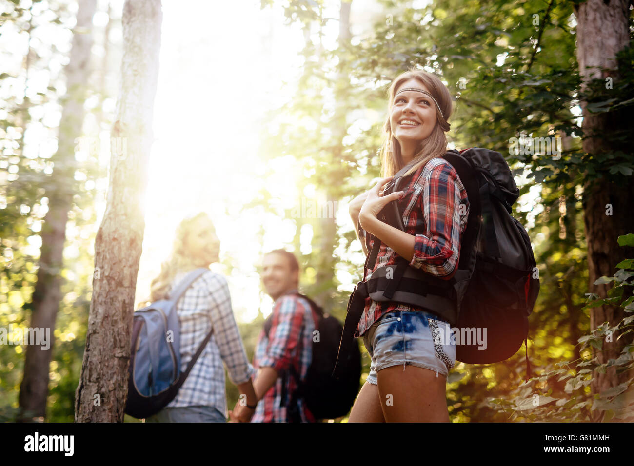 People exploring forest as recreation Stock Photo - Alamy