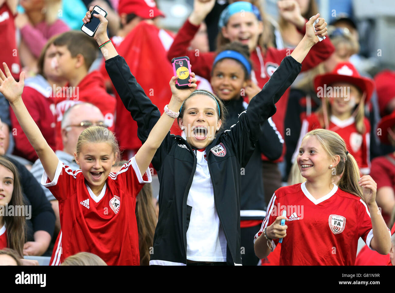 Fans cheer for Canada during the Women's International Friendly match ...