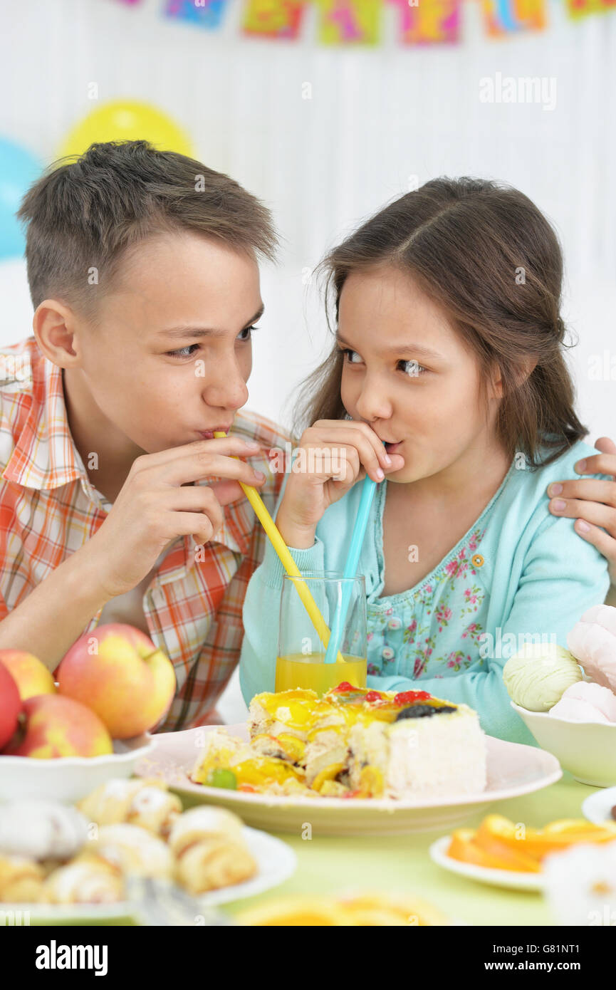 Happy children with cake Stock Photo - Alamy