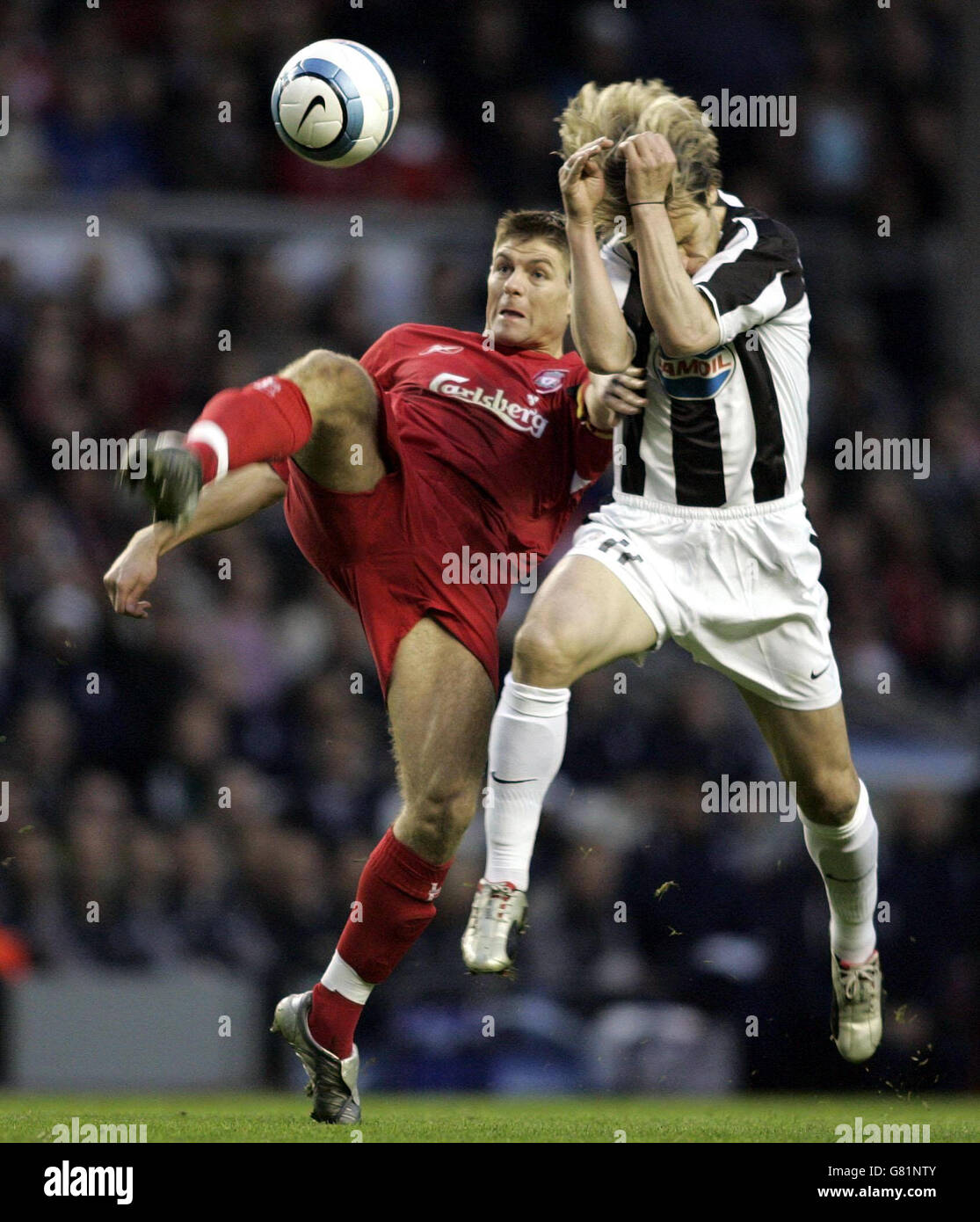 Liverpool's Steven Gerrard (L) challenges Juventus' Pavel Nedved Stock ...
