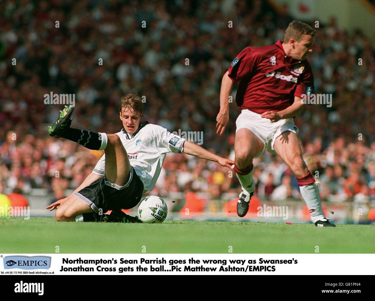 Northampton's Sean Parrish goes the wrong way as Swansea's Jonathan ...