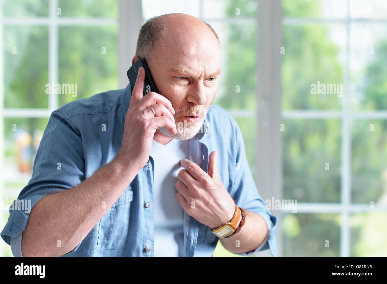 elderly man with phone Stock Photo - Alamy
