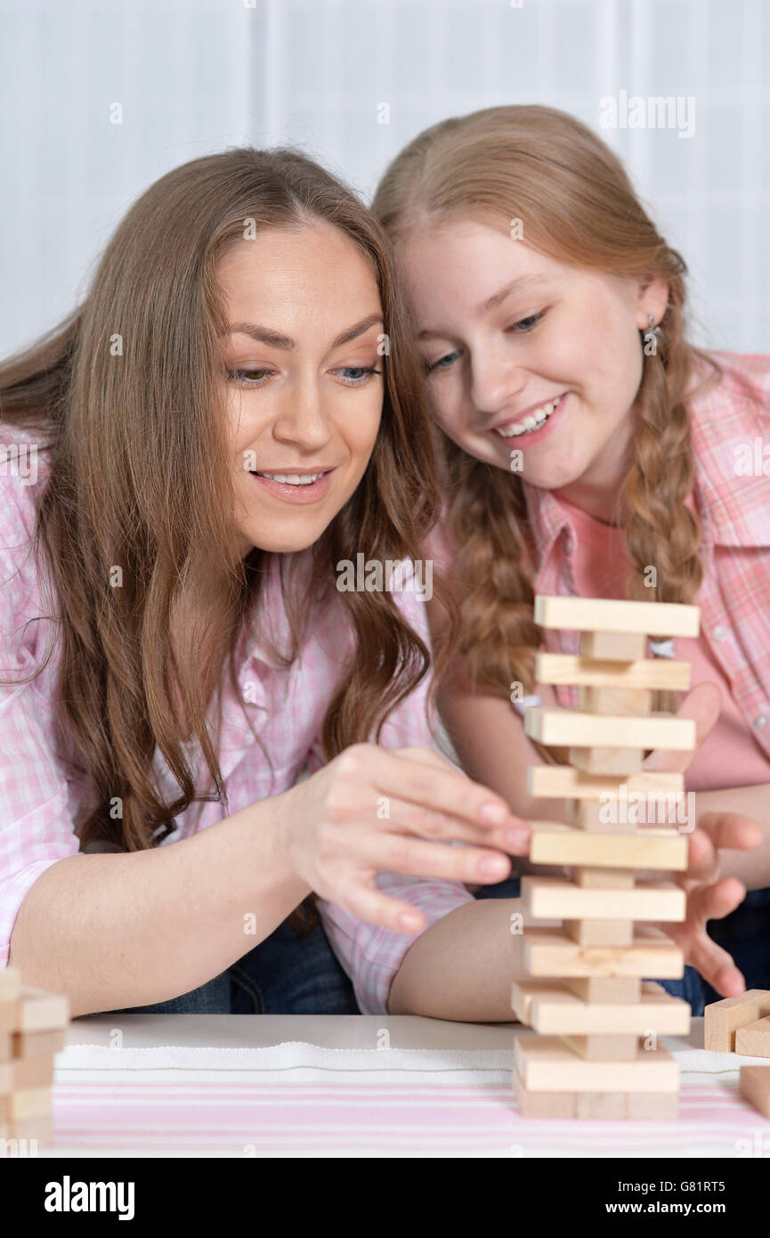 Beautiful mother looking daughter playing hi-res stock photography and ...
