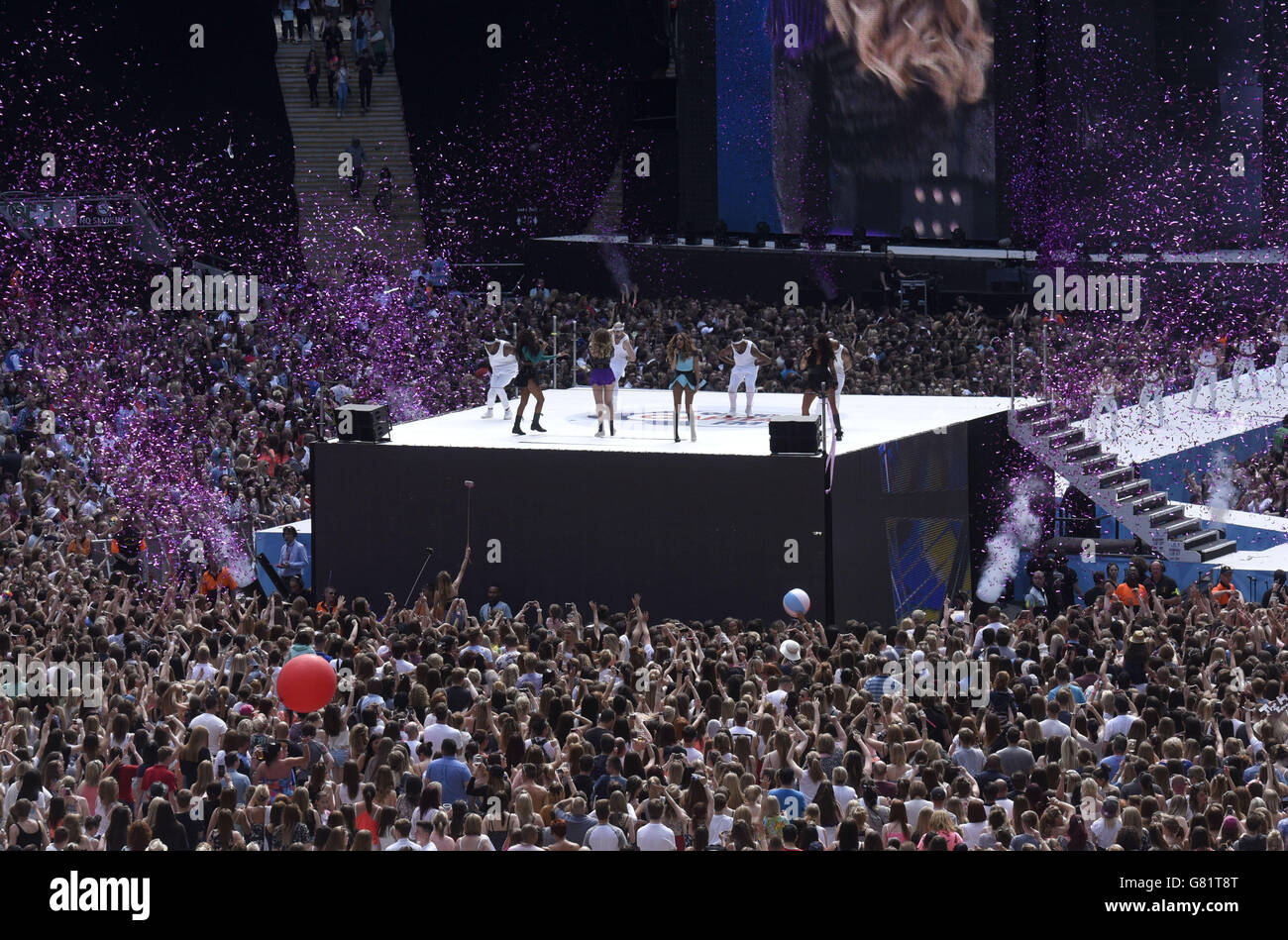 Little Mix performing live at the Capital FM Summertime Ball 2015 held ...