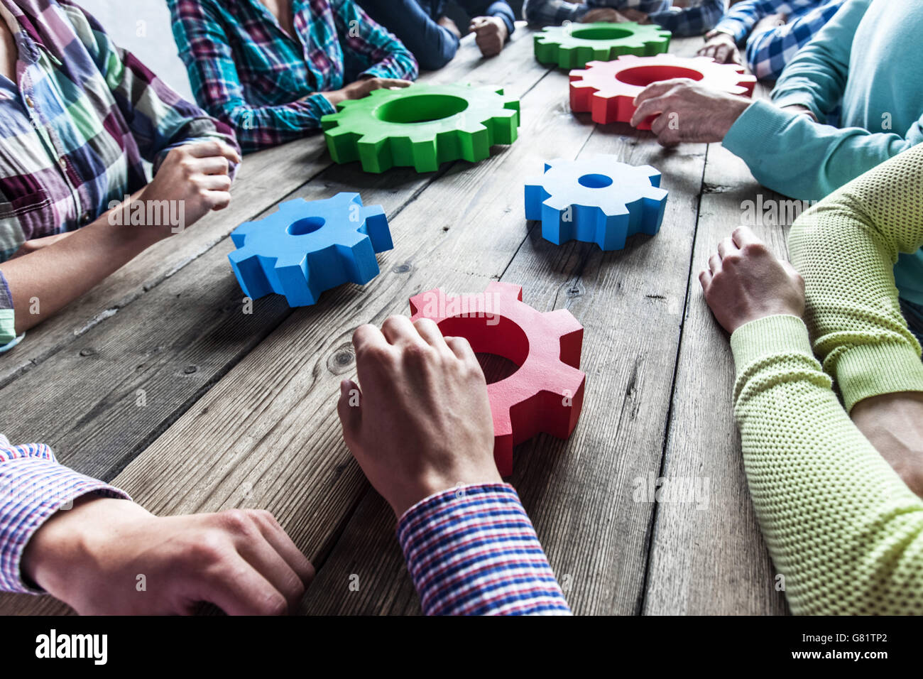 Cogs people hi-res stock photography and images - Alamy
