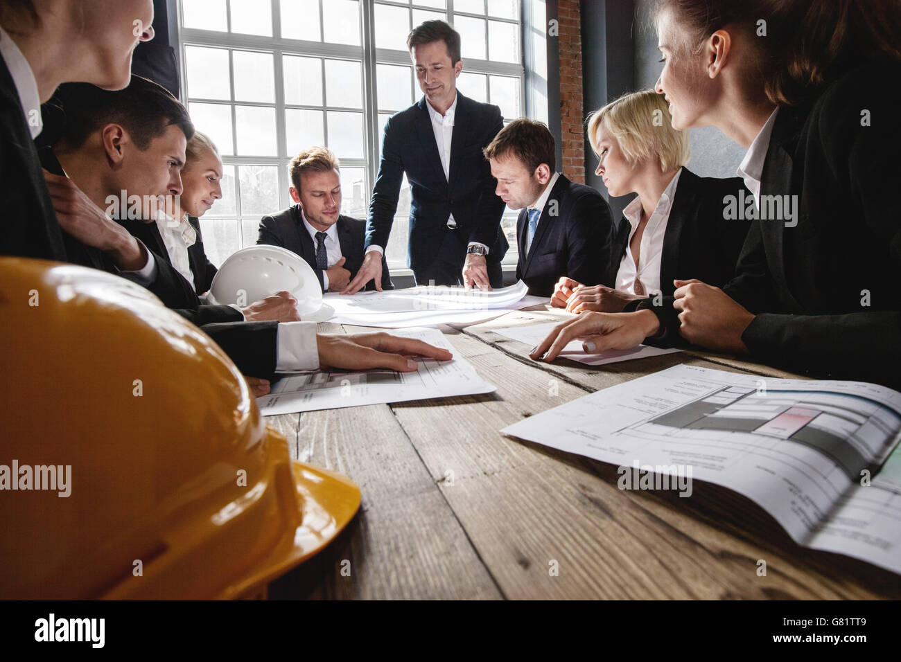 Business people group on meeting with construction engineer architect ...