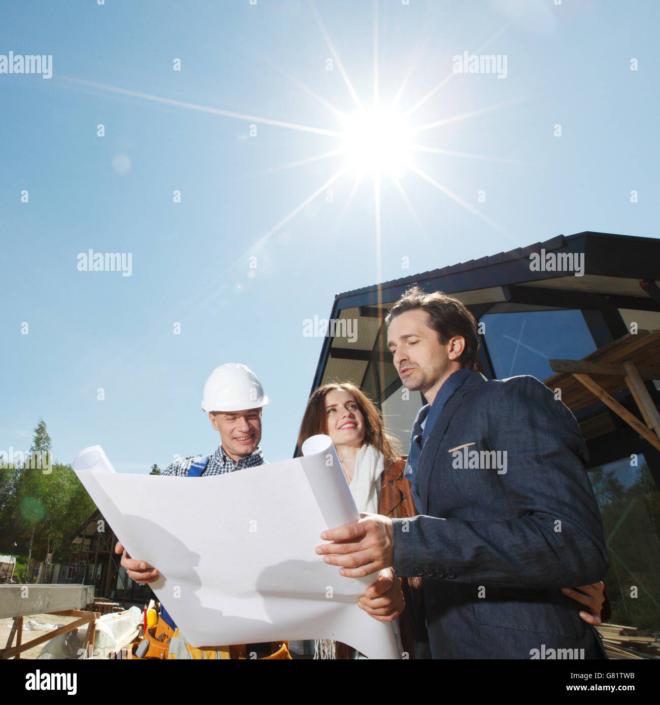 Worker shows house design hi-res stock photography and images - Alamy